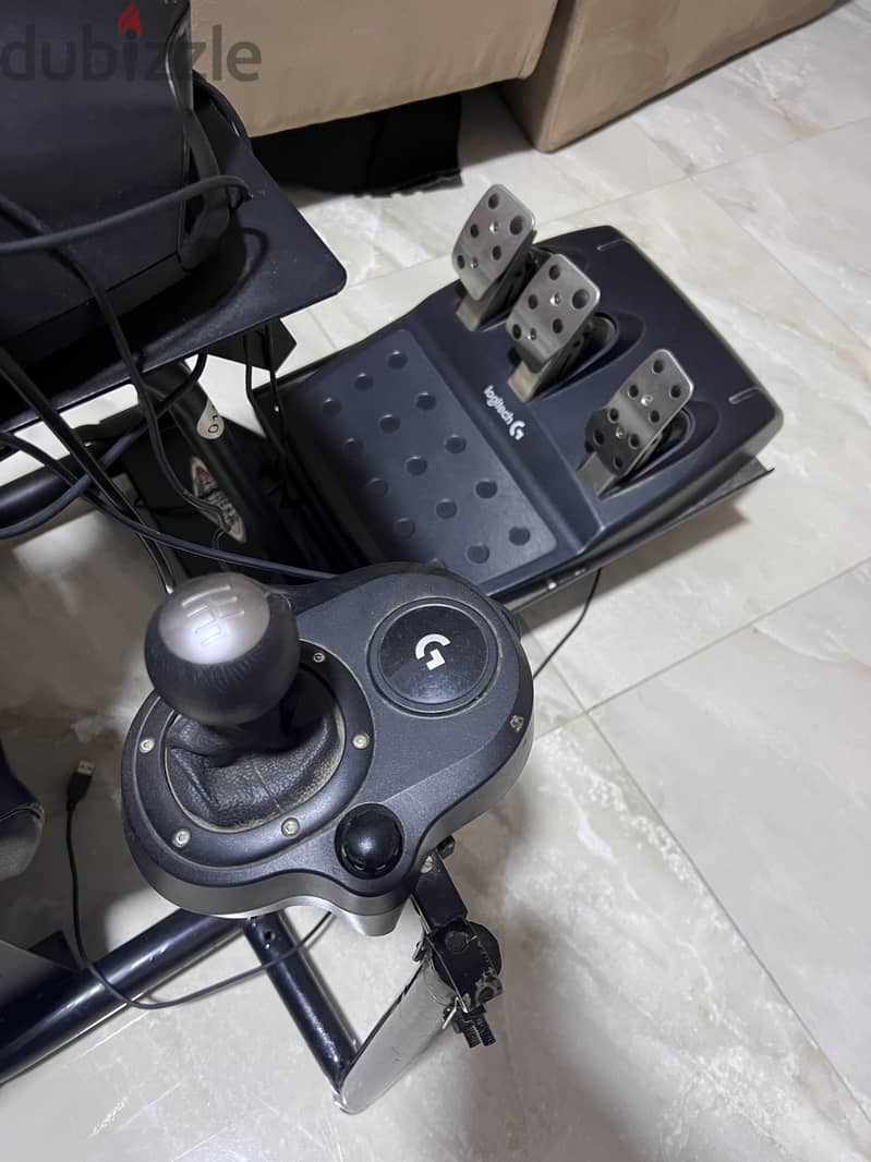 Leather sim racing seat with Gforce steering wheel, stick shift - ألعاب ...