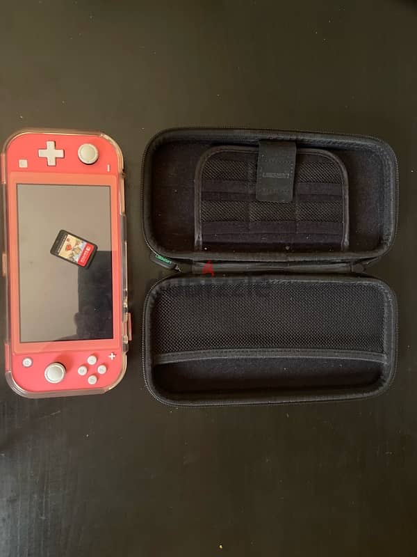 Nintendo switch lite, UAE version - أجهزة ألعاب فيديو - 206619273