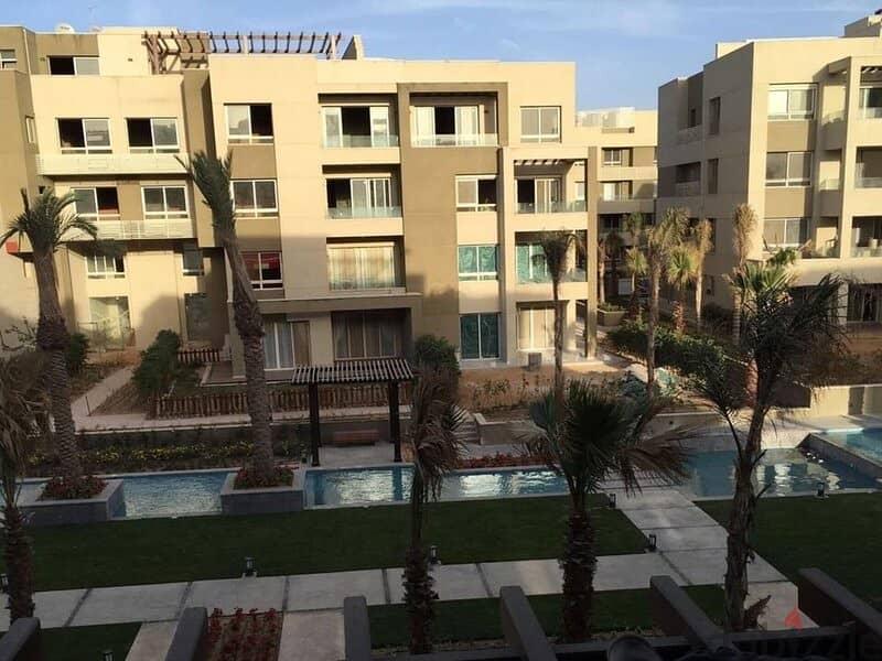 Finished apartment by Hassan Allam, Swan Lake Compound, in front of Al ...